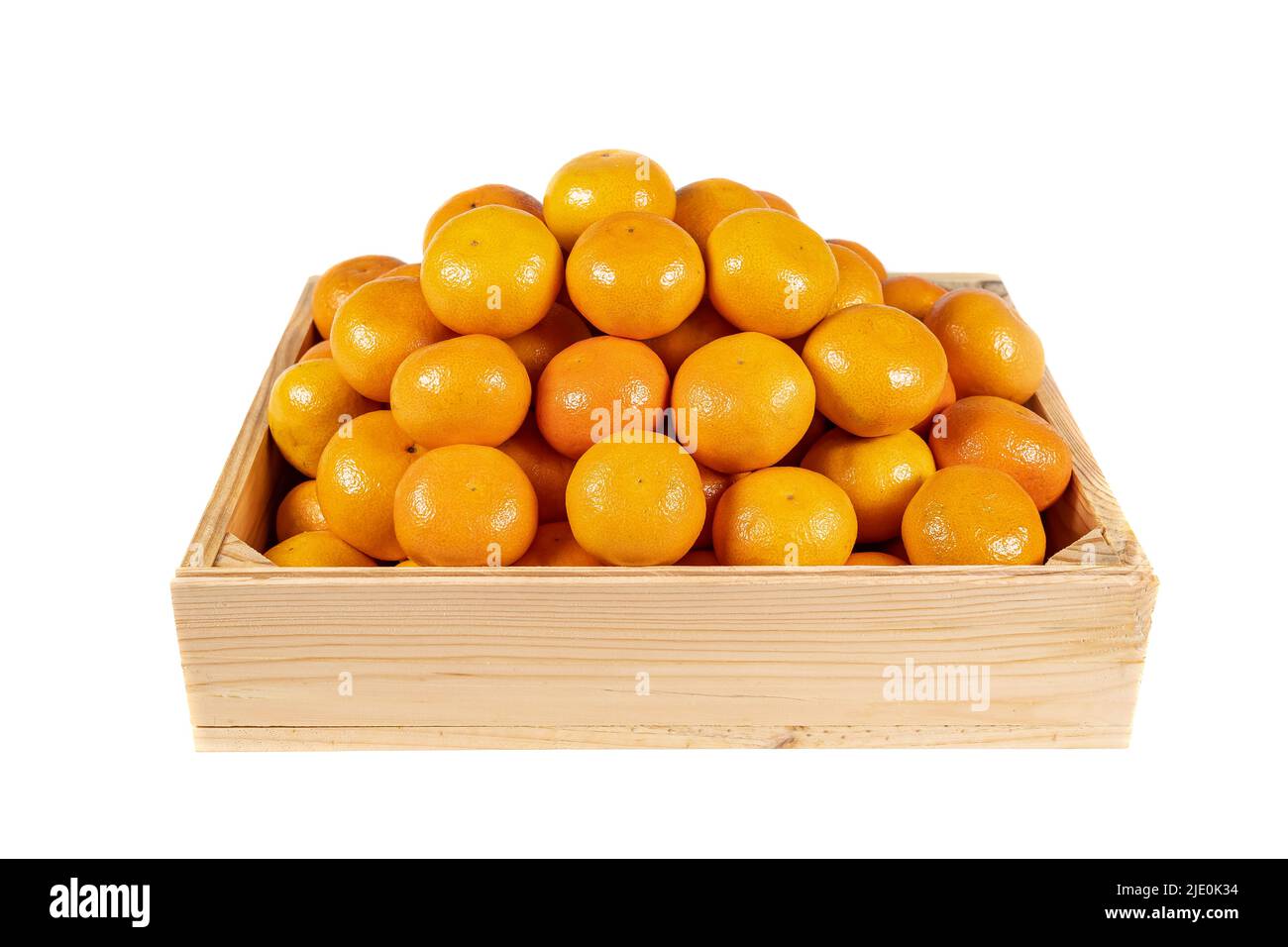 Wooden box with stack of tangerines on isolated white background Stock ...