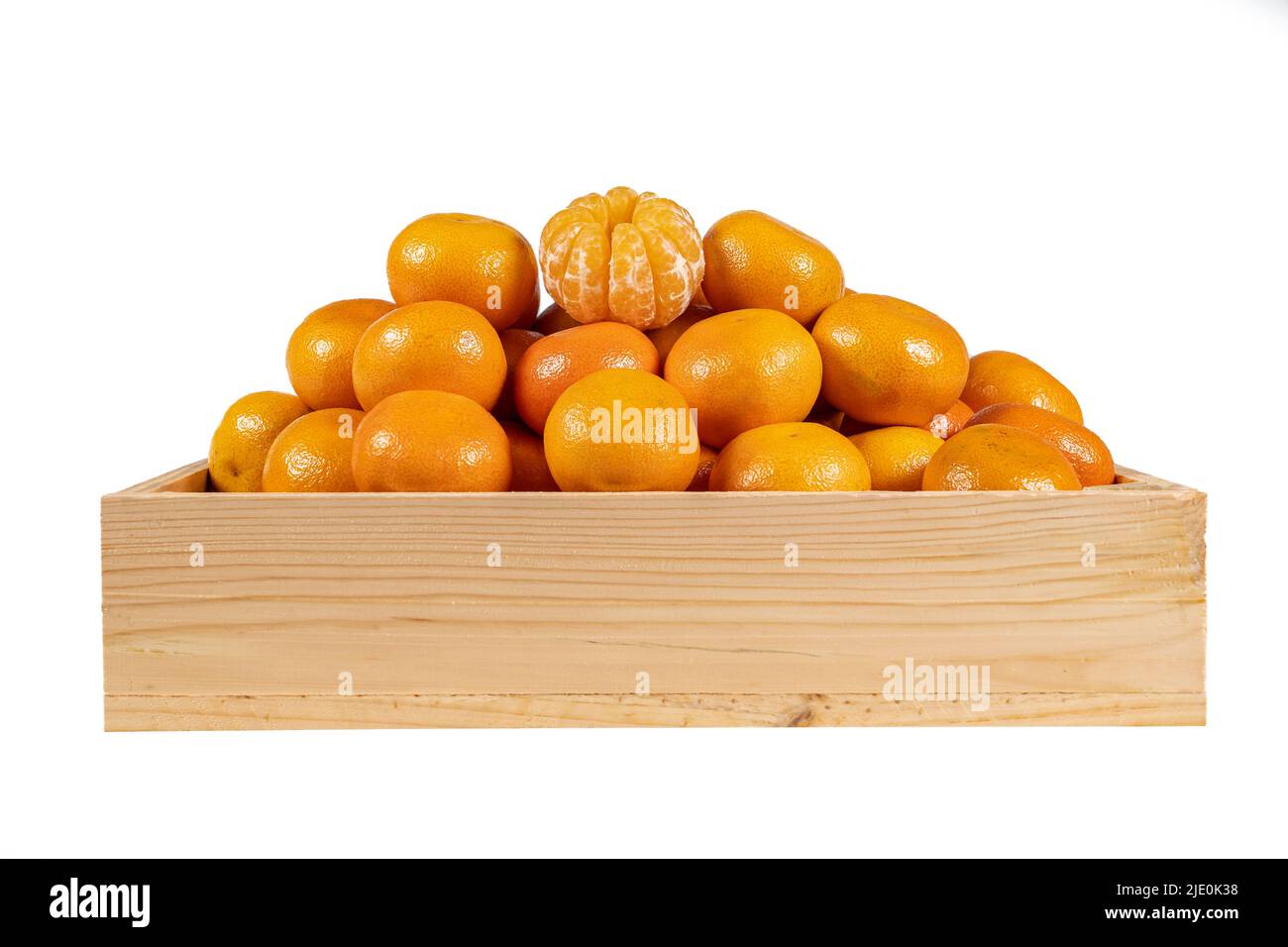 Wooden box with stack of tangerines on isolated white background Stock ...