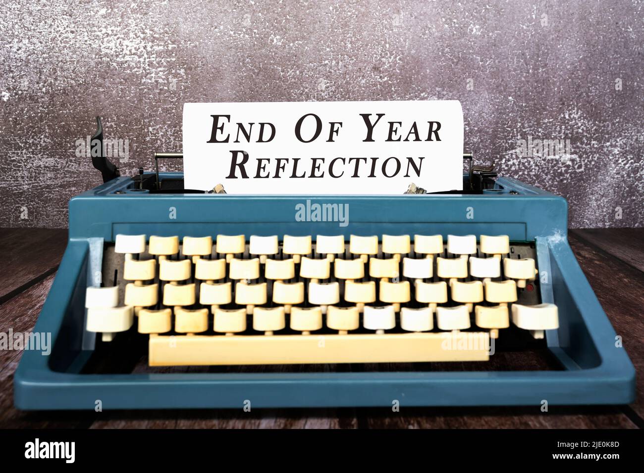 End of year reflection words typed on an old typewriter. New year ...