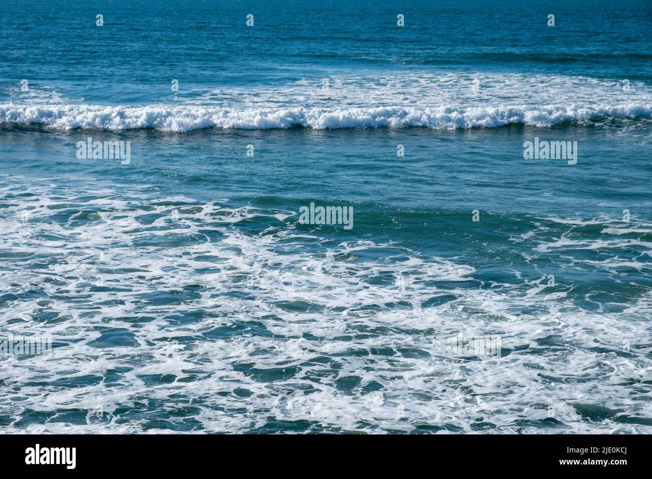 Foam and small wave at the Atlantic Ocean in Portugal Mainland Stock ...