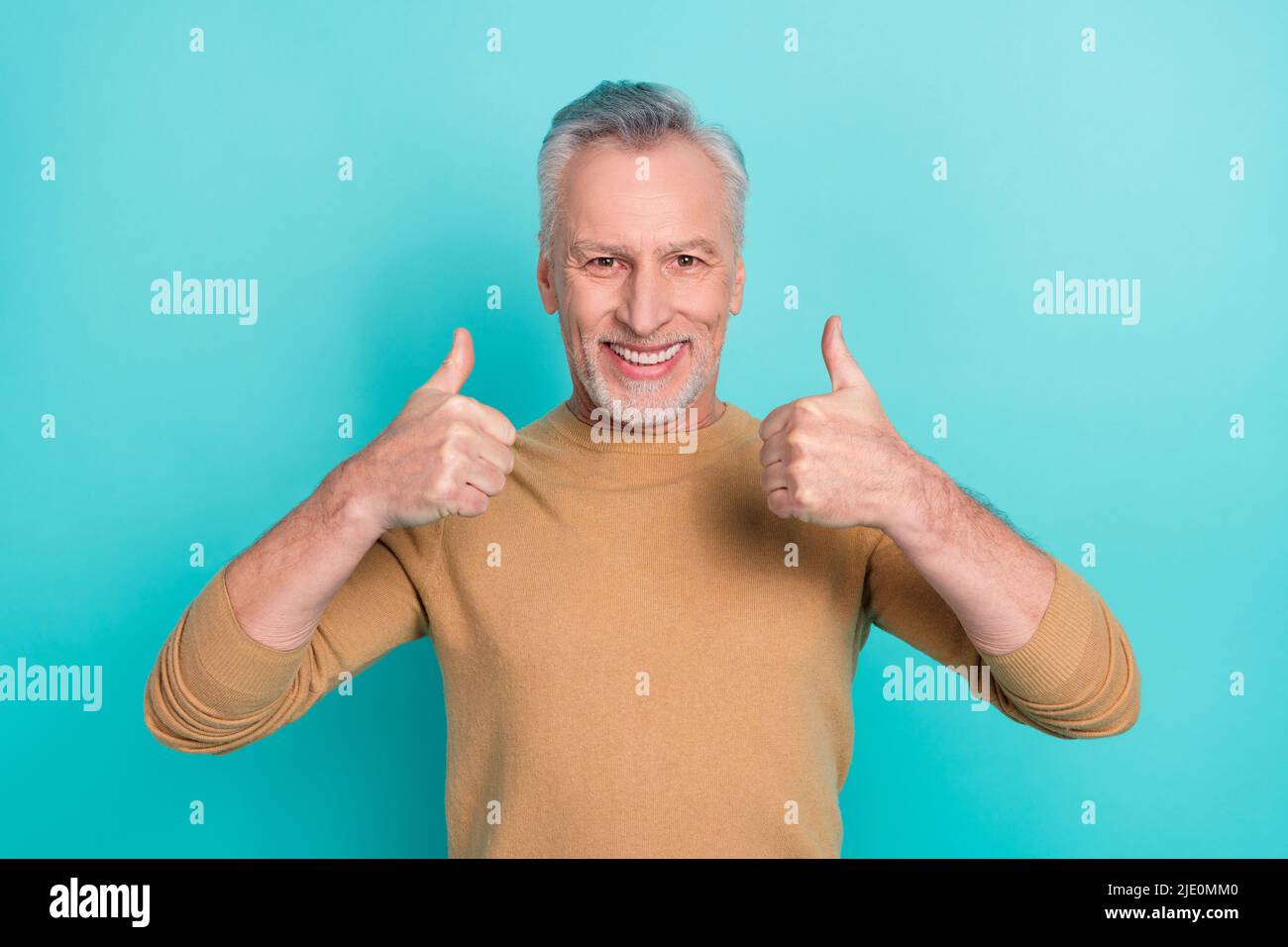 Photo of positive friendly person two hands fingers show thumb up ...