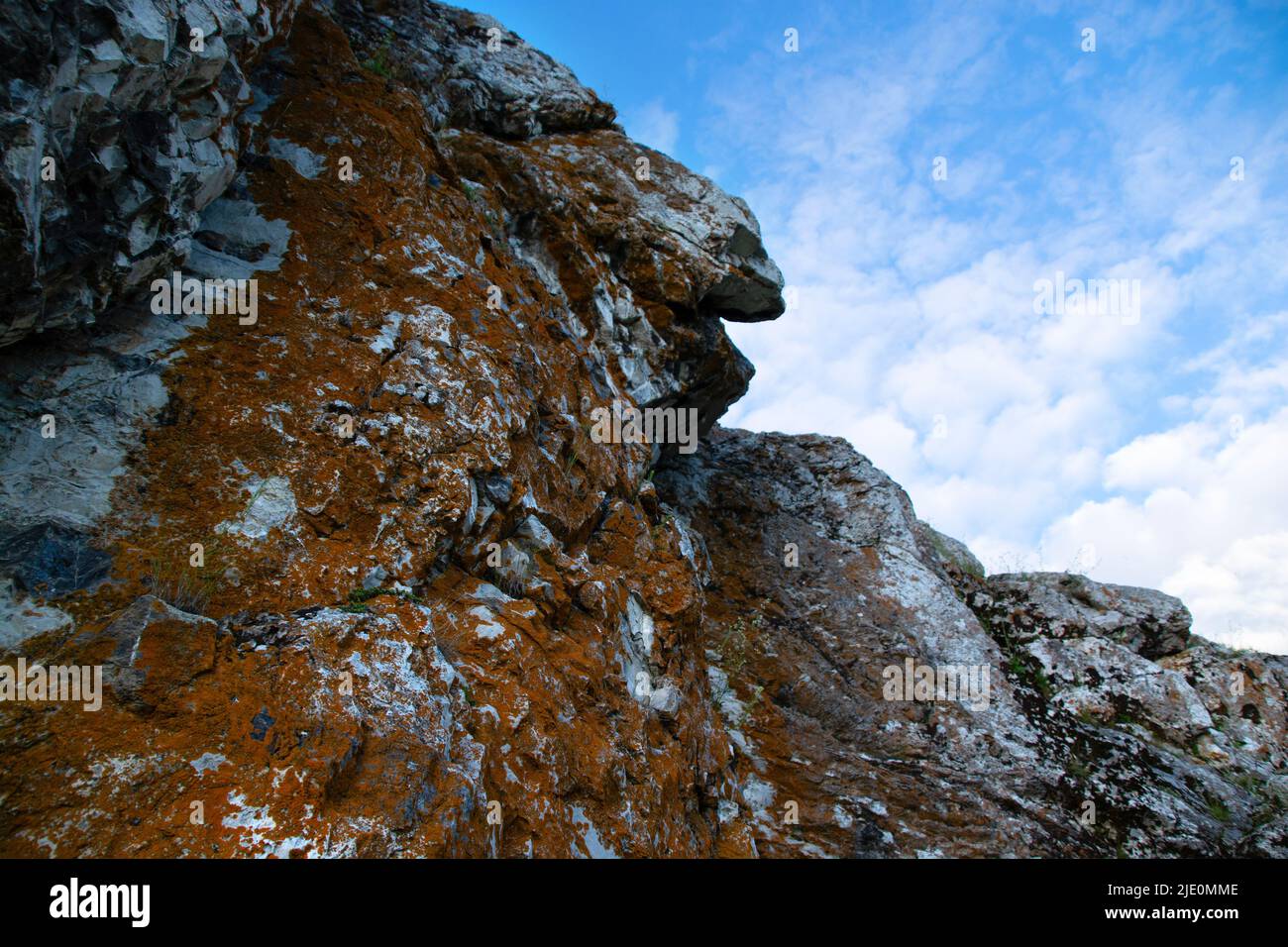 rock close-up with grass and sky Stock Photo - Alamy