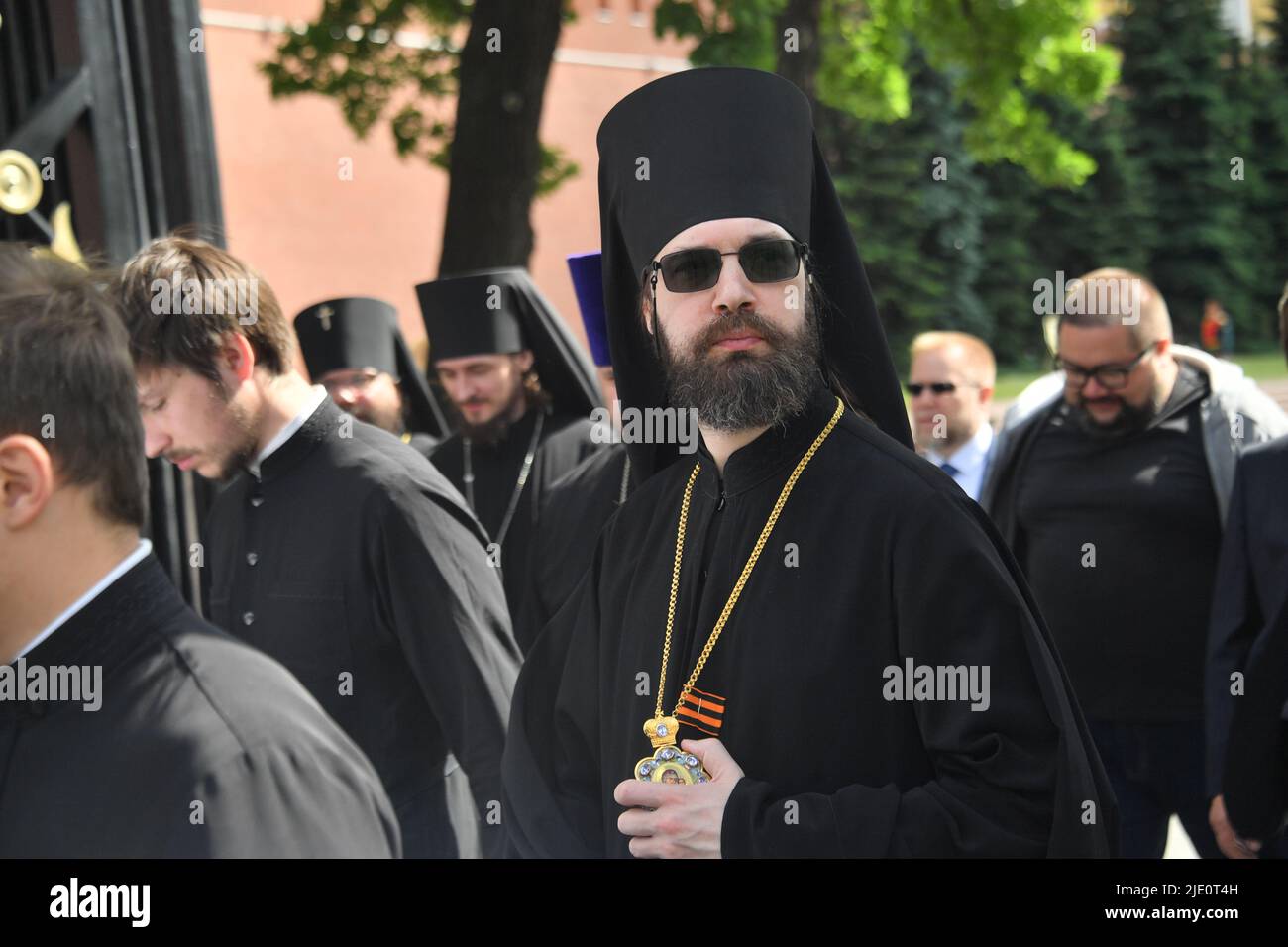Moscow. Priests during the wreath-laying ceremony to the Tomb of the ...