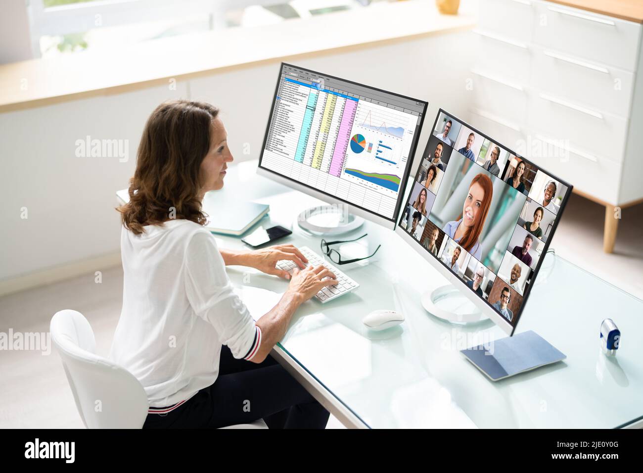 Online Training Course And Video Conference In Office Stock Photo - Alamy