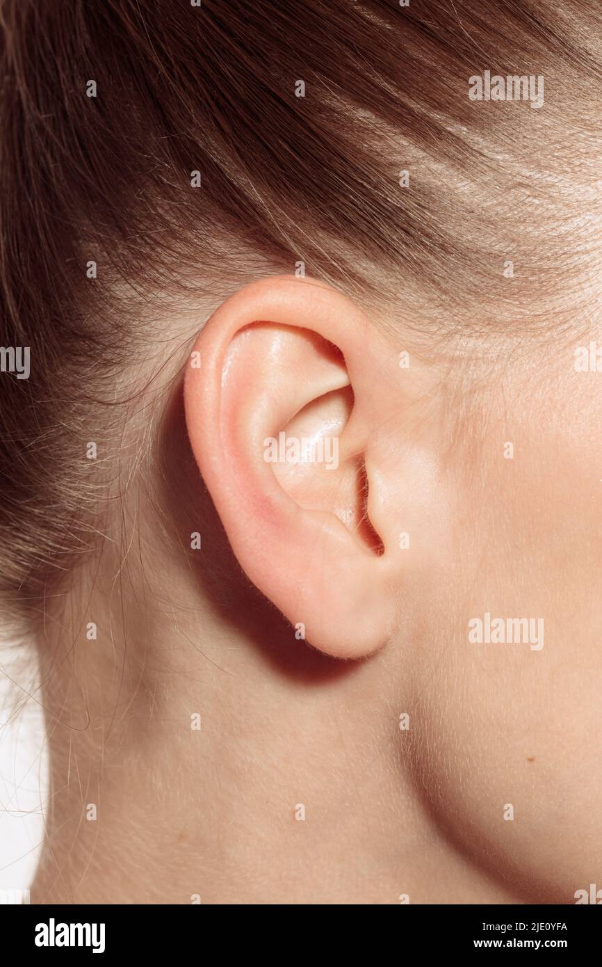 Close up. Parts of head. Female ear. Beauty, fashion, skincare ...