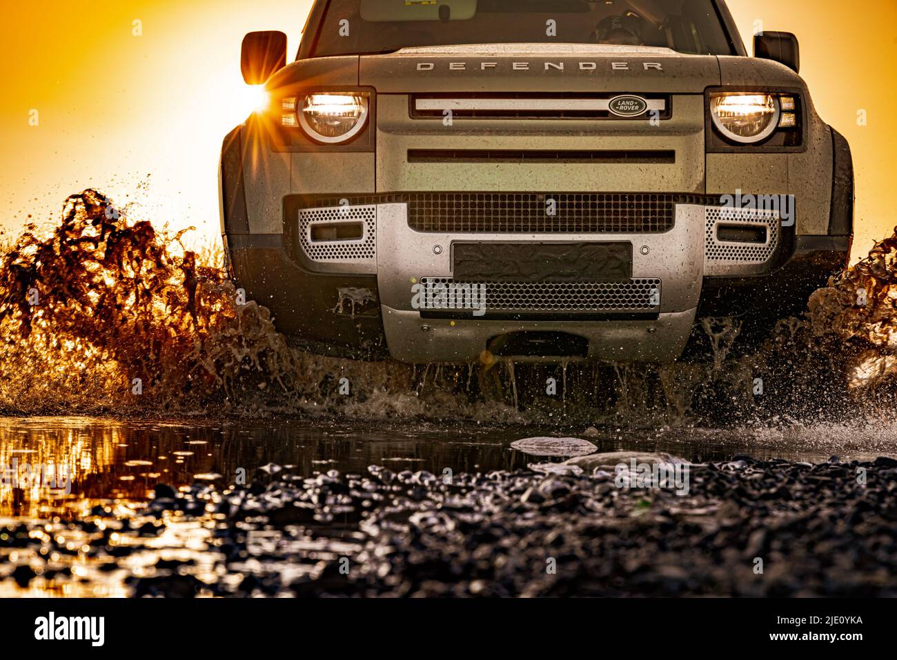 Rybachy, RUSSIA - May 30 2022: Off-roading New Land Rover Defender. The ...