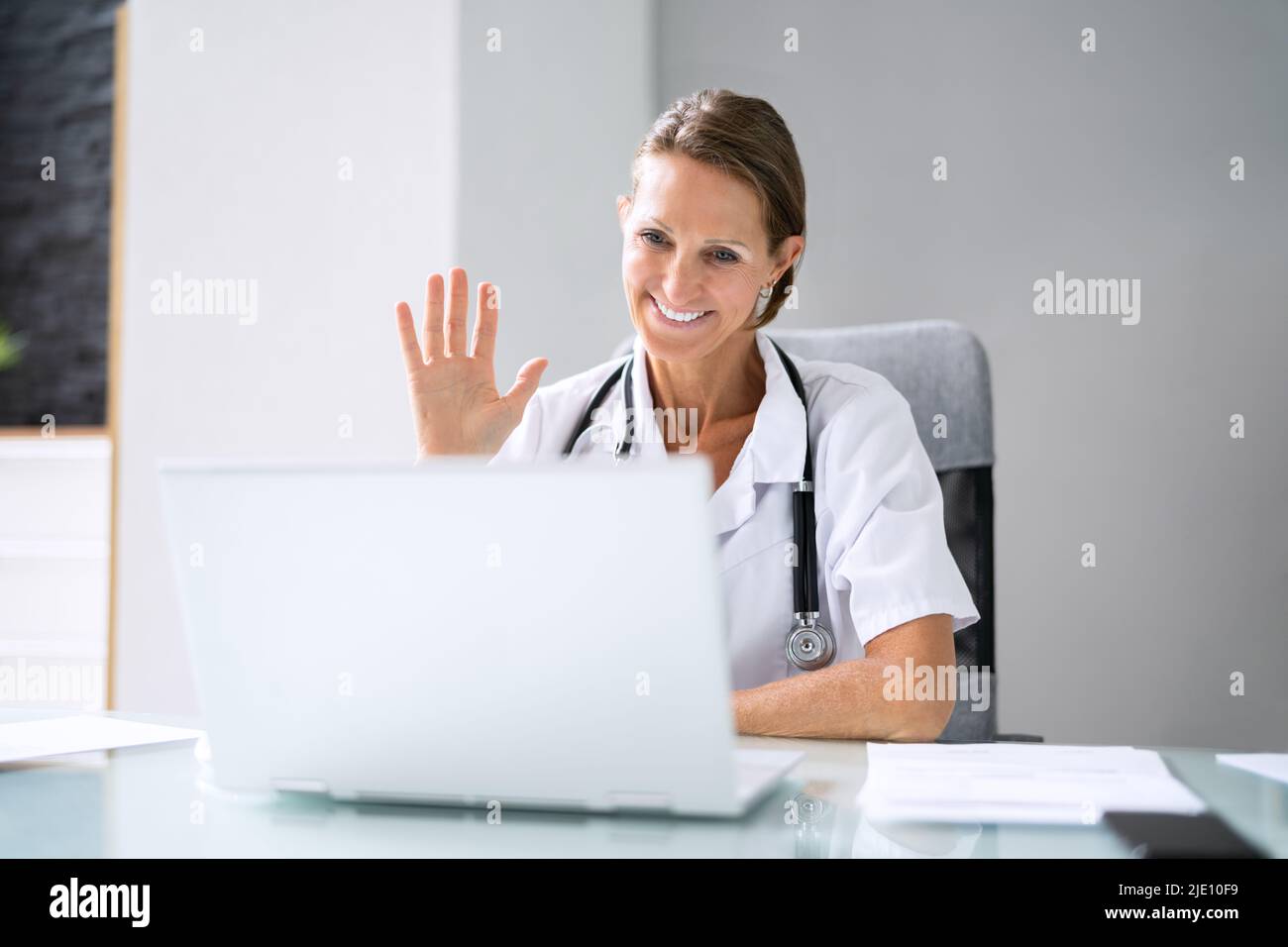 Woman having video call doctor hi-res stock photography and images - Alamy