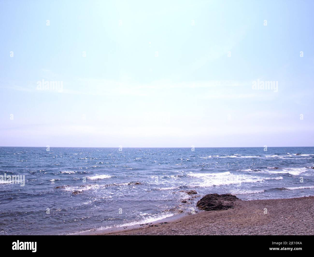 Turquoise color water, mild temperature, blue sky and dramatic clouds ...