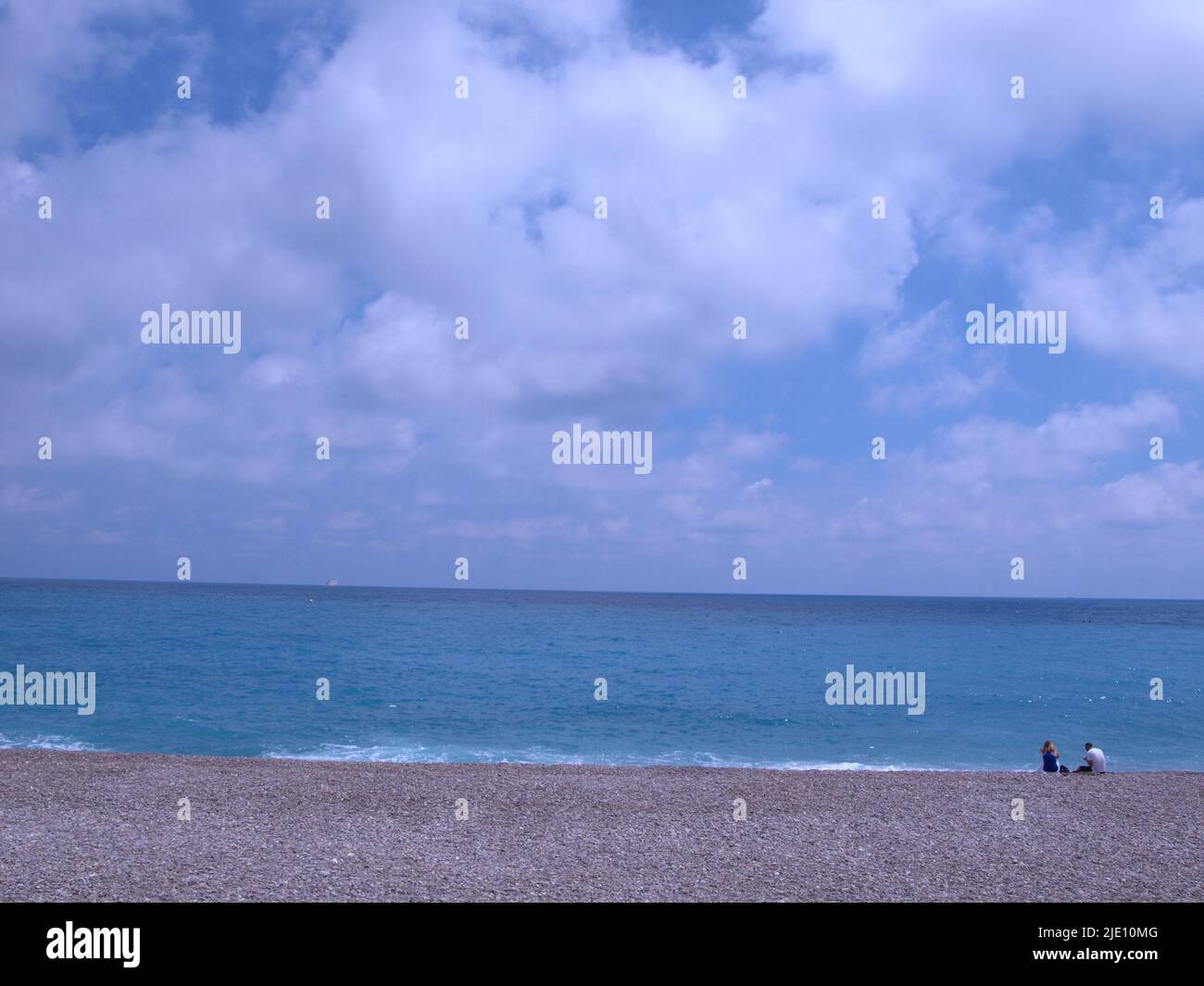 Turquoise color water, mild temperature, blue sky and dramatic clouds ...