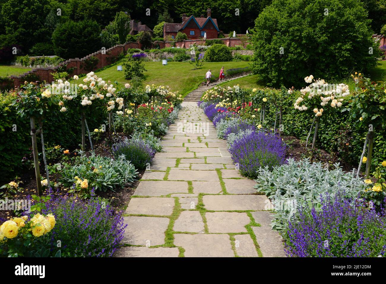Ornamental garden with densely planted flower beds and the Garden ...