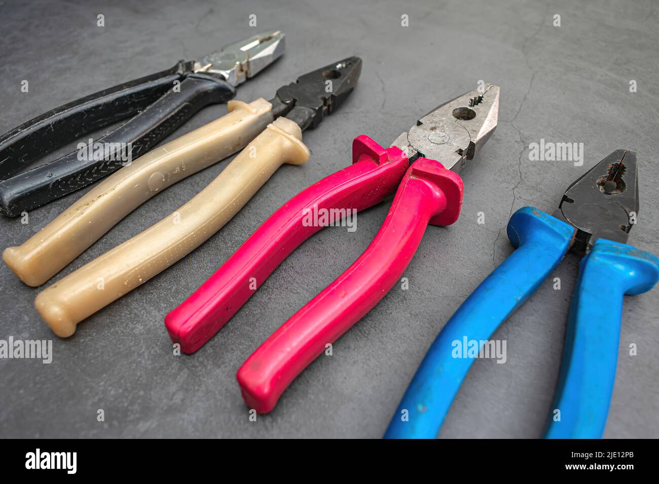 A small set of old hand pliers for household repairs Stock Photo - Alamy
