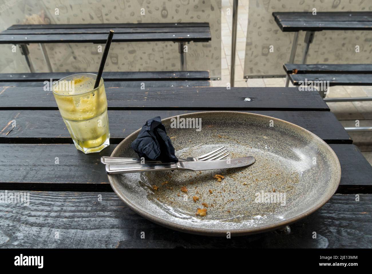 After lunch plate and glass tumbler Stock Photo - Alamy