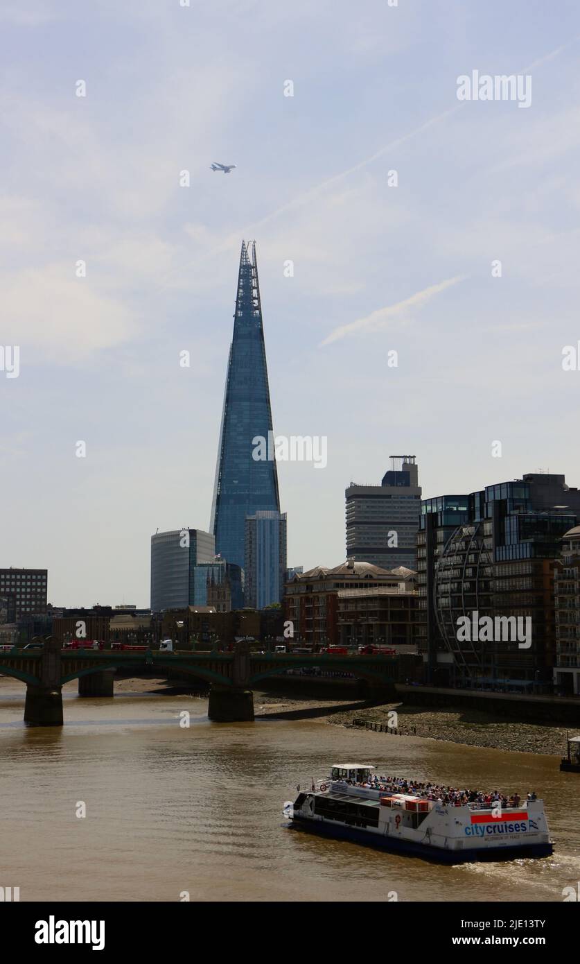 London skyline with the Shard skyscraper tour boat and an Airbus A380 ...