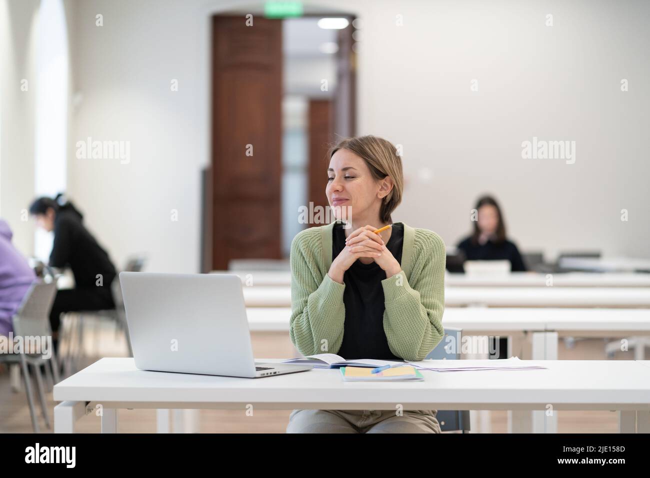 Woman attend class hi-res stock photography and images - Alamy