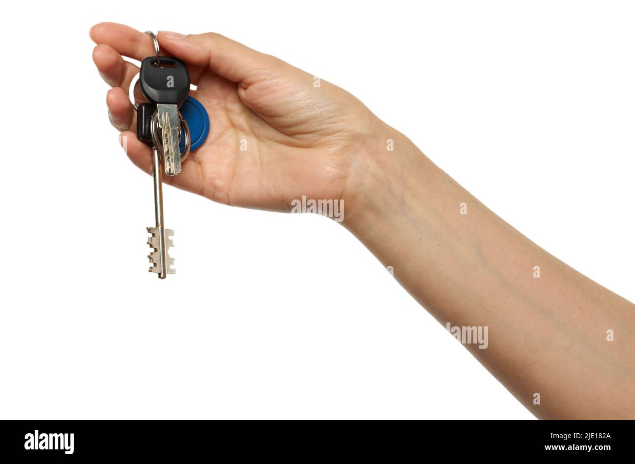 Woman hand with key. Isolaned on white background with clipping path ...