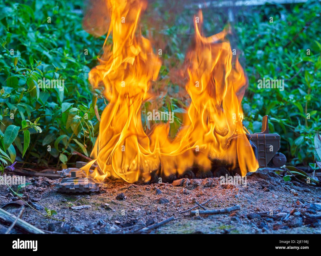 Model Russian tank on fire Stock Photo - Alamy