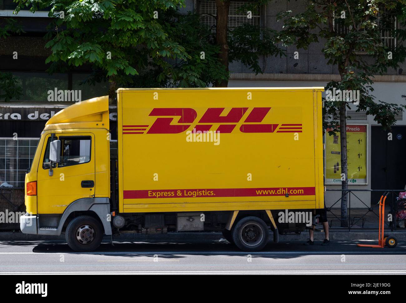 German express delivery mail company DHL truck seen stationed in Spain ...