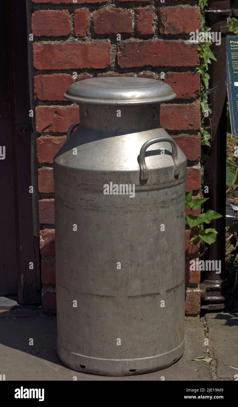 Metal milk churn, Saint Fagans museum, Cardiff Stock Photo - Alamy