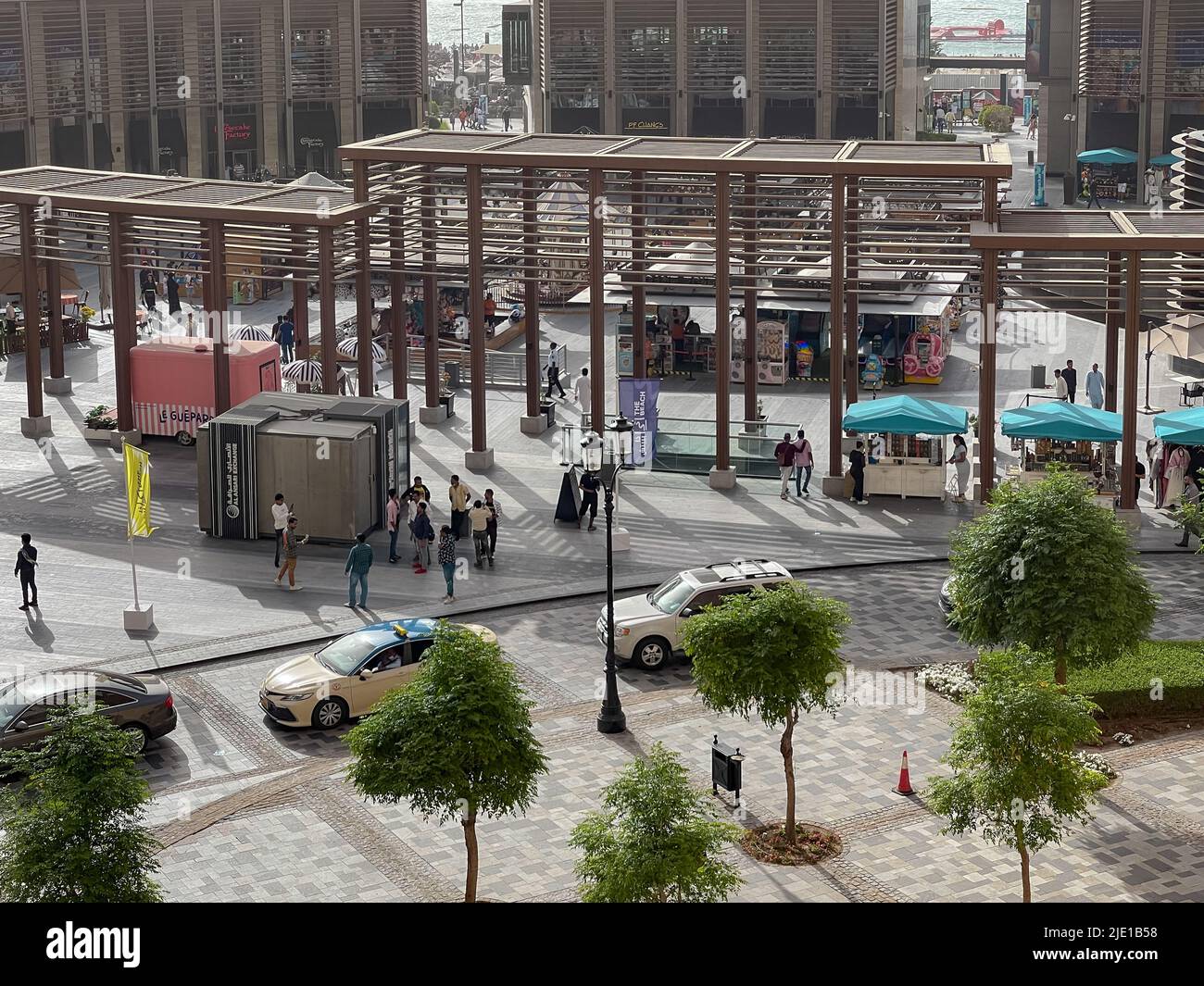 High view of Dubai waterfront complex, retail stores, restaurants and ...