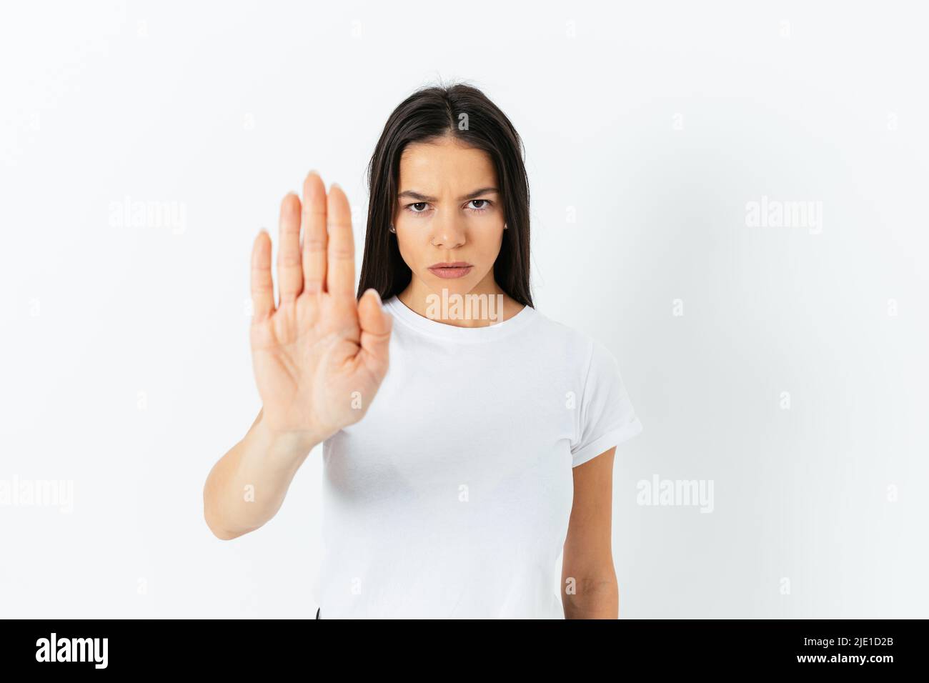 STOP woman said, angry young female shows stop gesture with palm while ...
