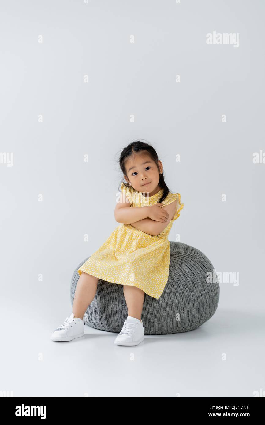 Asian girl child sitting chair hi-res stock photography and images - Alamy