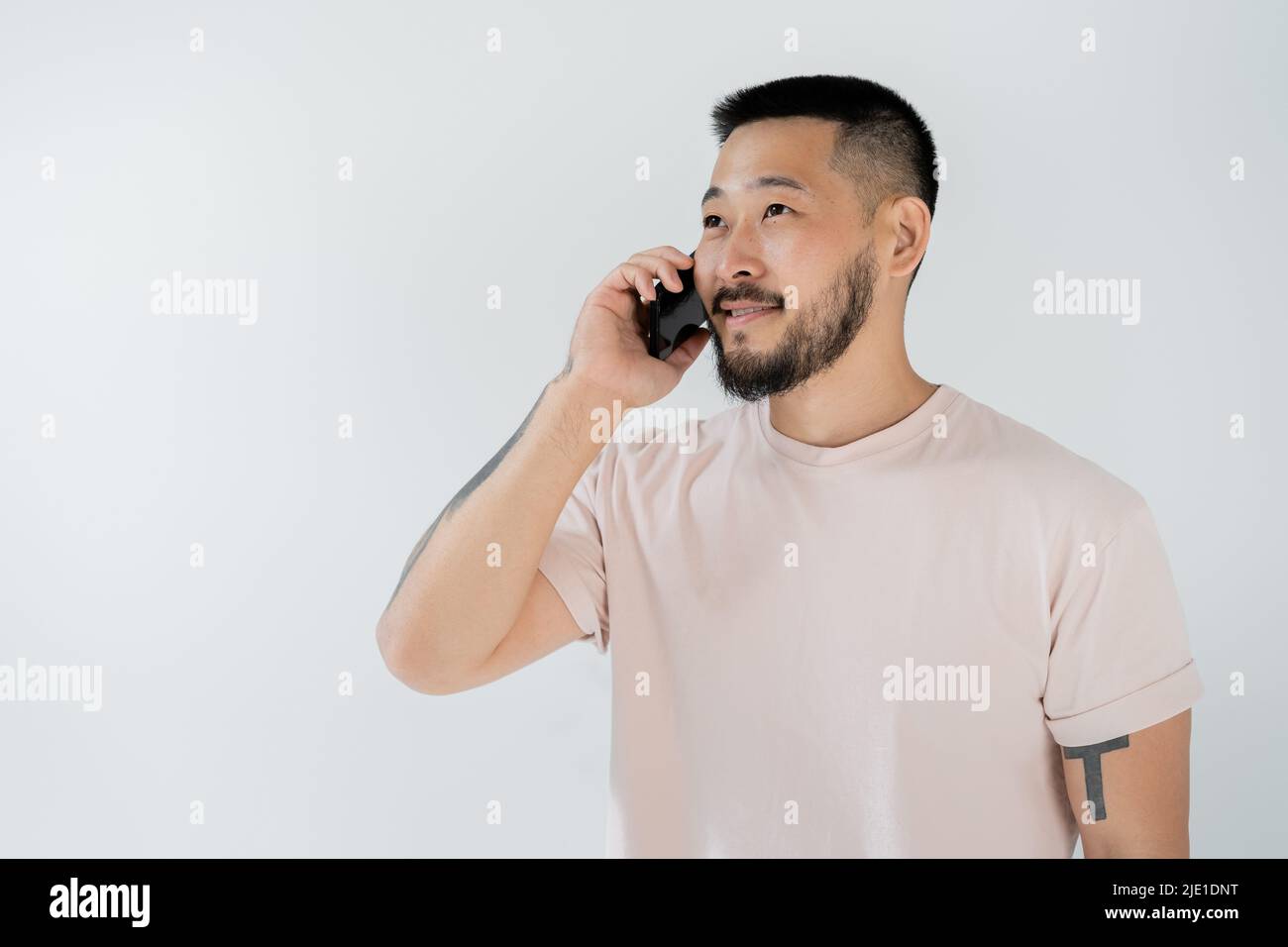 Asian man talking brunette hi-res stock photography and images - Alamy