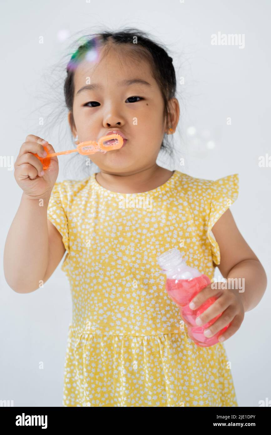 Child blowing bubbles isolated hi-res stock photography and images - Alamy