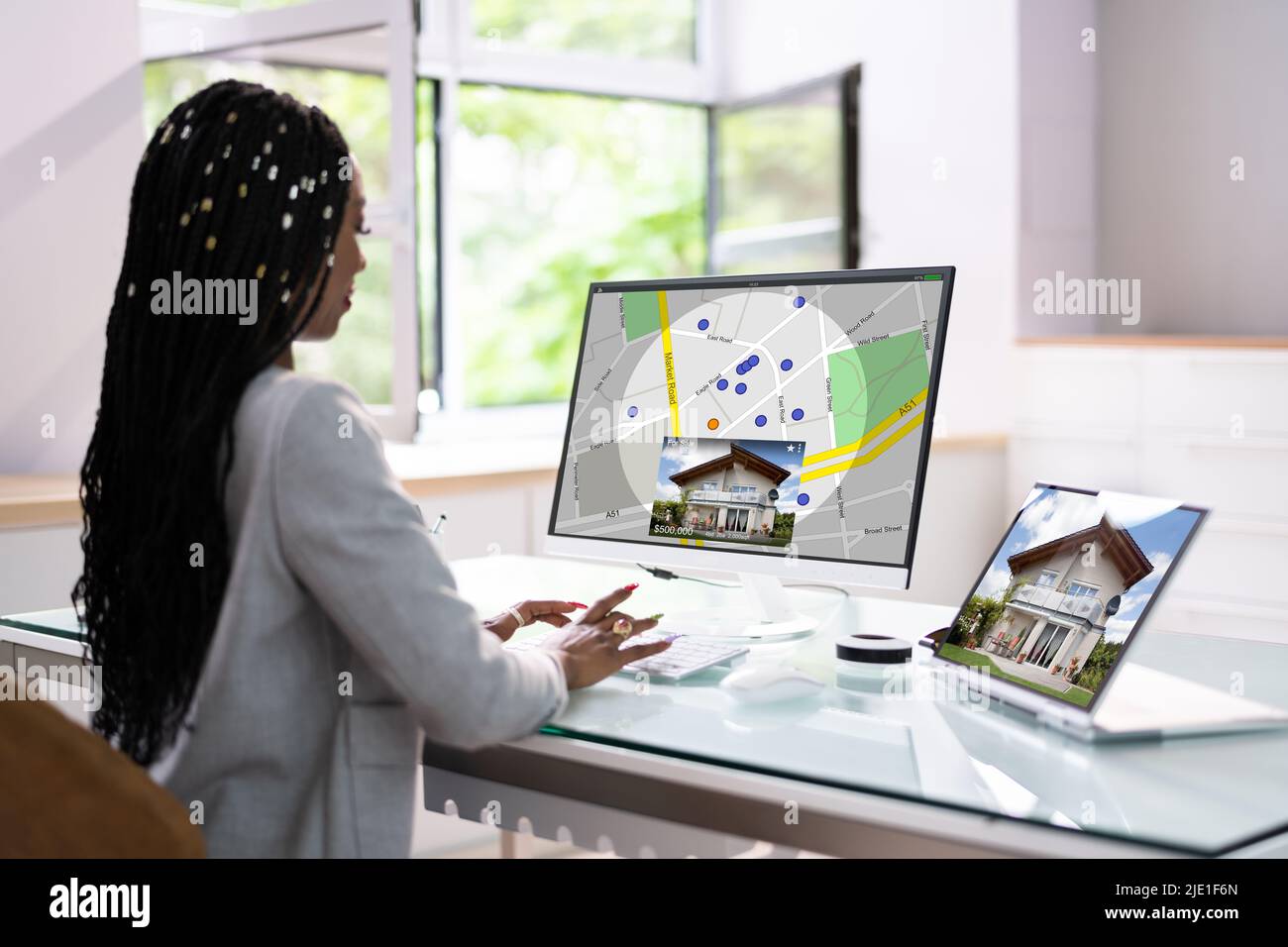 Real Estate Online Location Search On Computer Stock Photo - Alamy