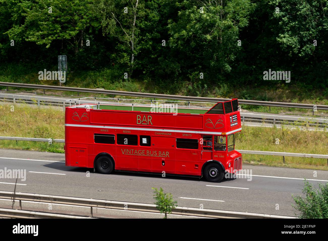 Open top Routemaster bus, Vintage Bus Bar, on the M40 motorway ...