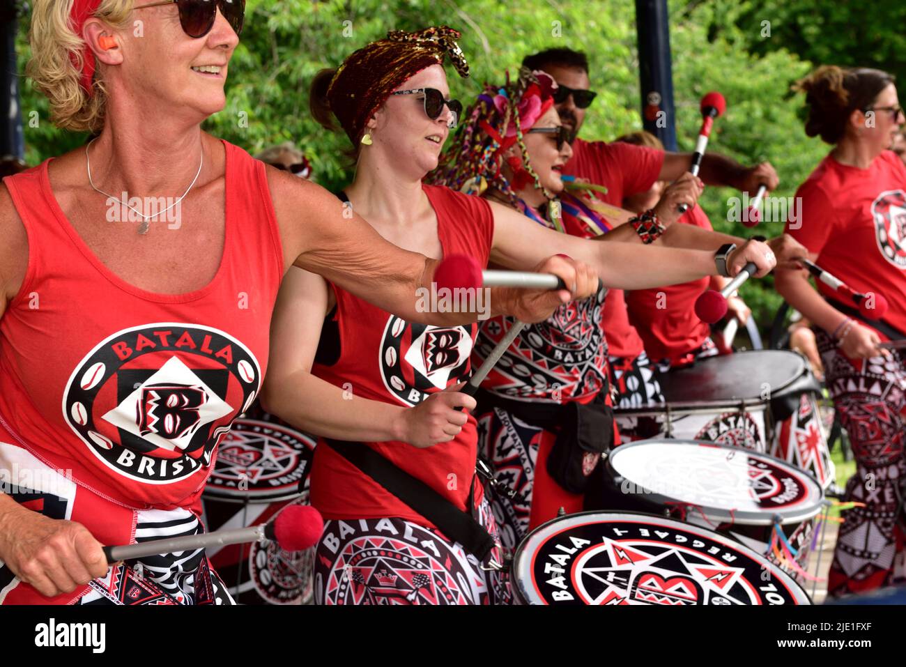 Batala drumming band performing in outdoor bandstand, Bristol, UK Stock ...