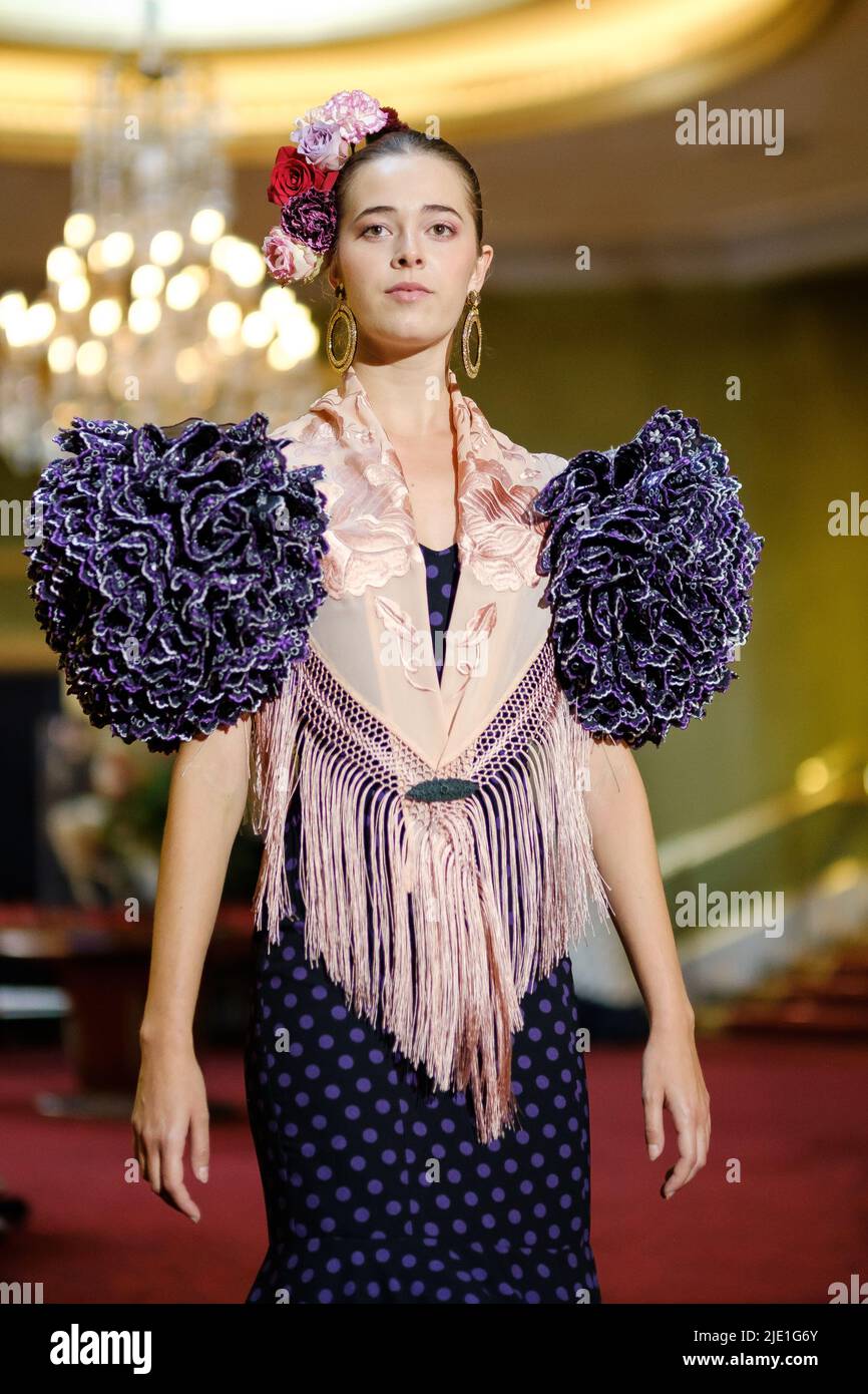 A model showcases SIMOF design, flamenco-inspired dresses at the ...