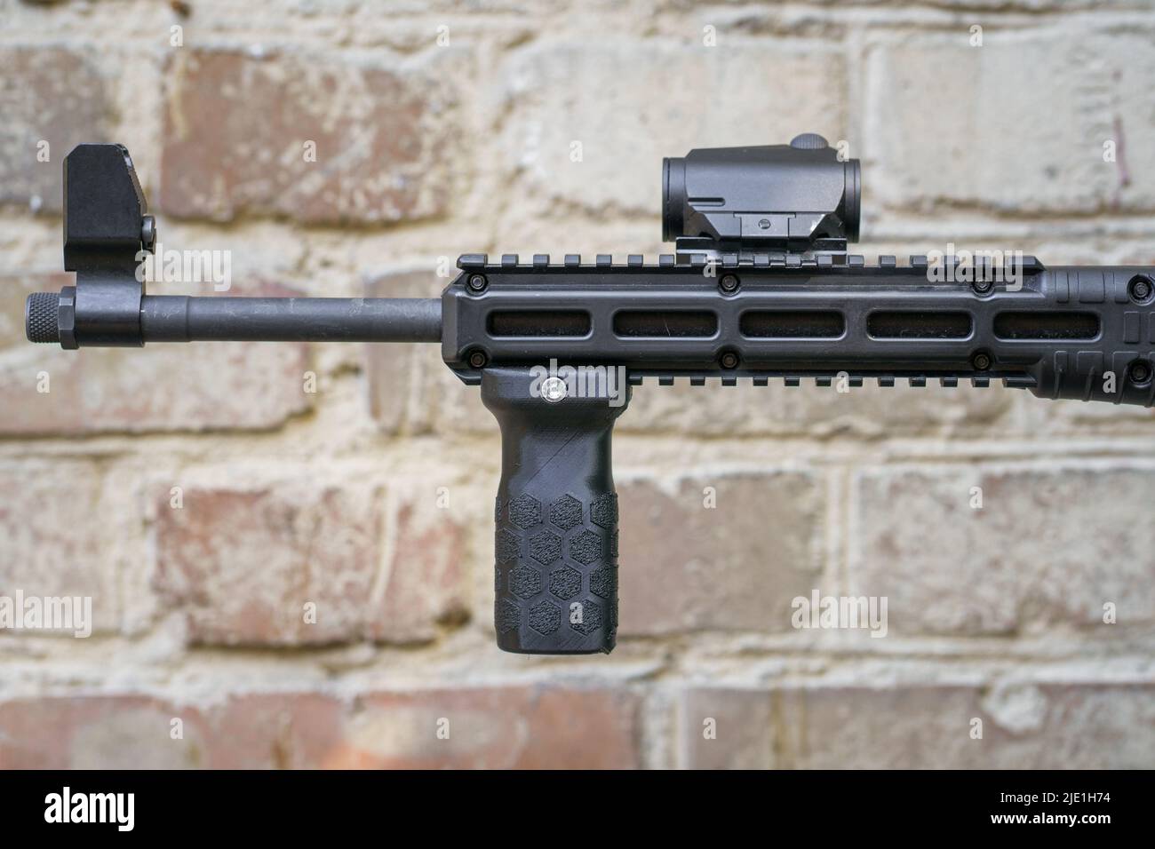 Weapon and military equipment for self defence. Gun isolated on old ...