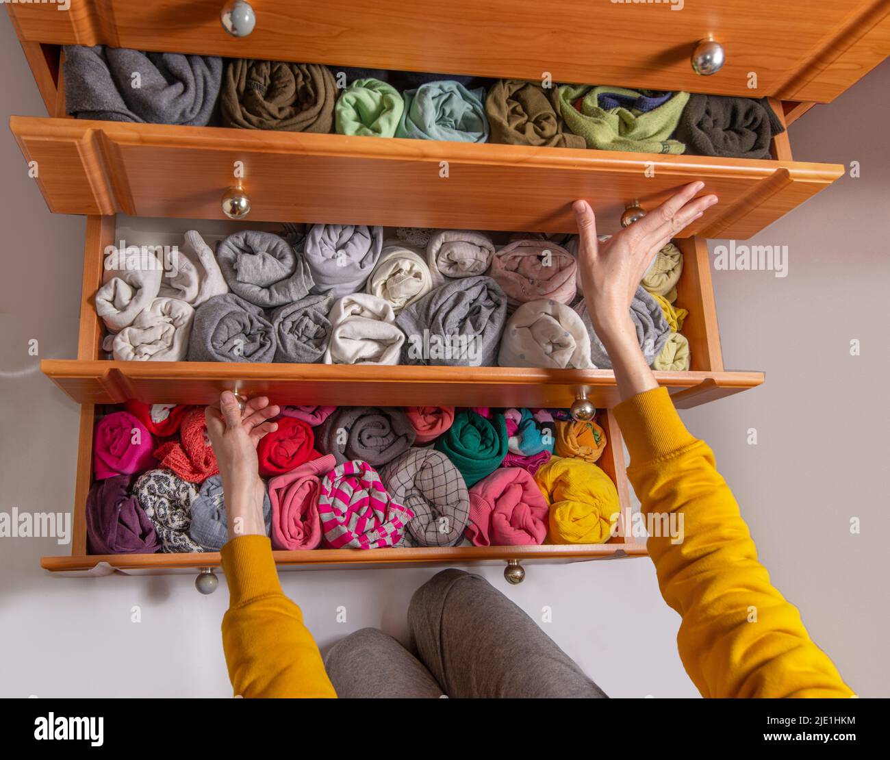 Sorting clothes hi-res stock photography and images - Alamy