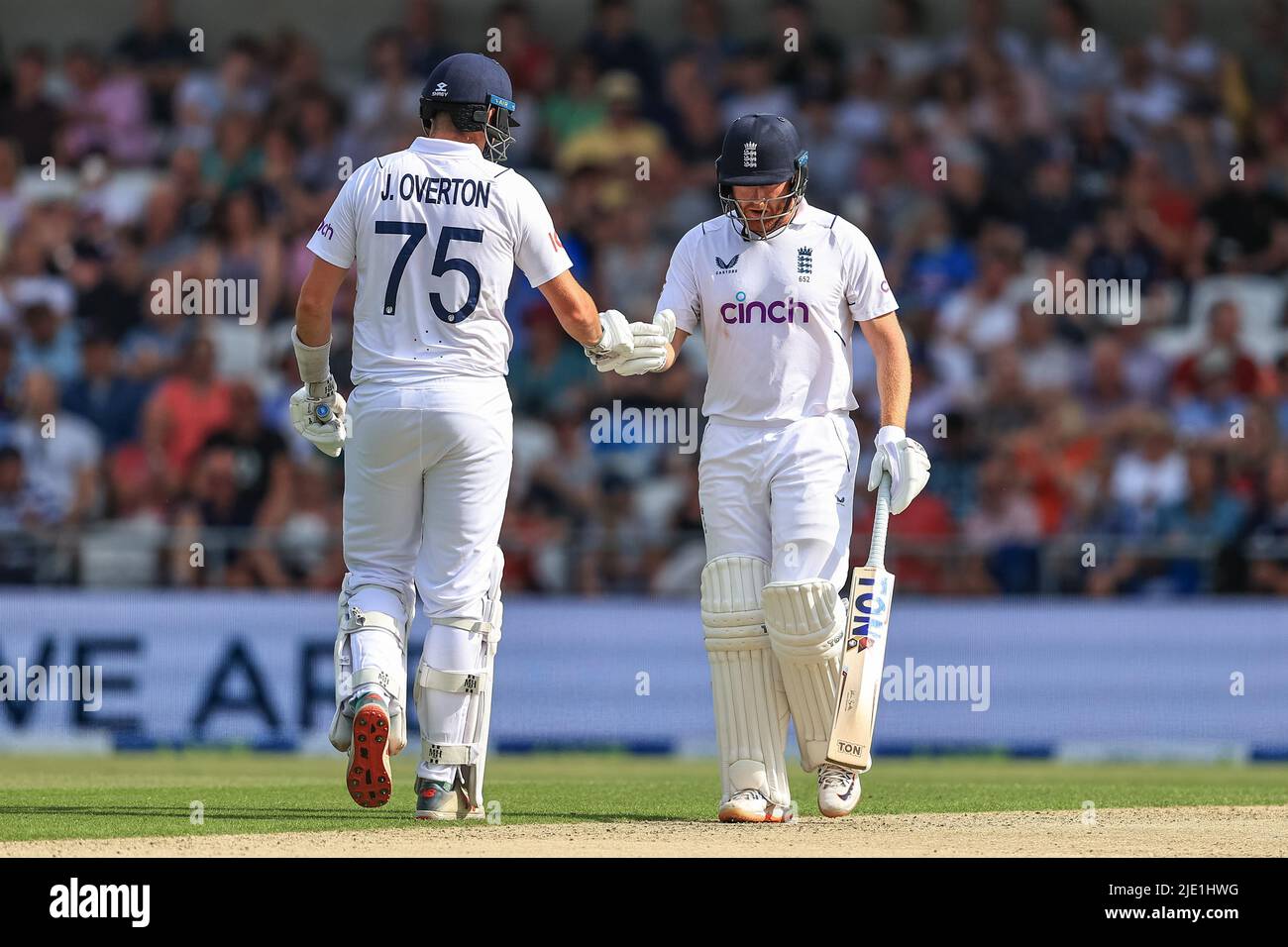 Jonny Bairstow of England fist bumps Jamie Overton of England after he ...