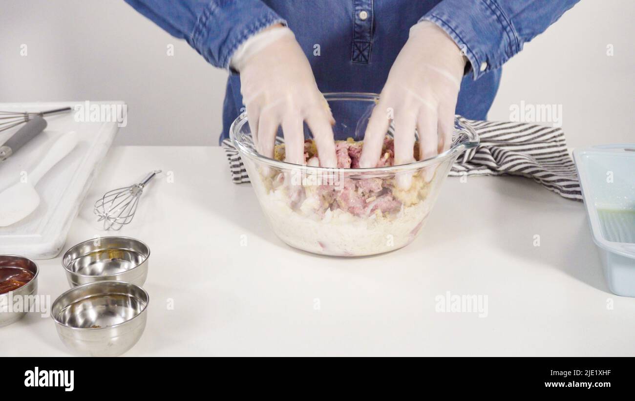 Step by step. Mixing ingredients for a classic beef meatloaf recipe in ...