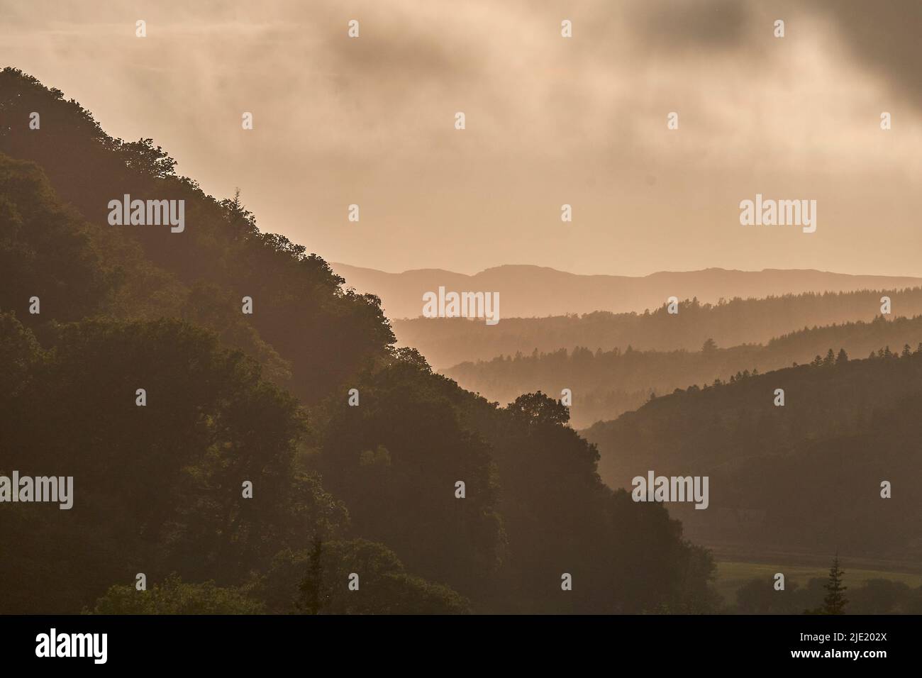Silhouette of Welsh hills and ridges at sunset Stock Photo - Alamy