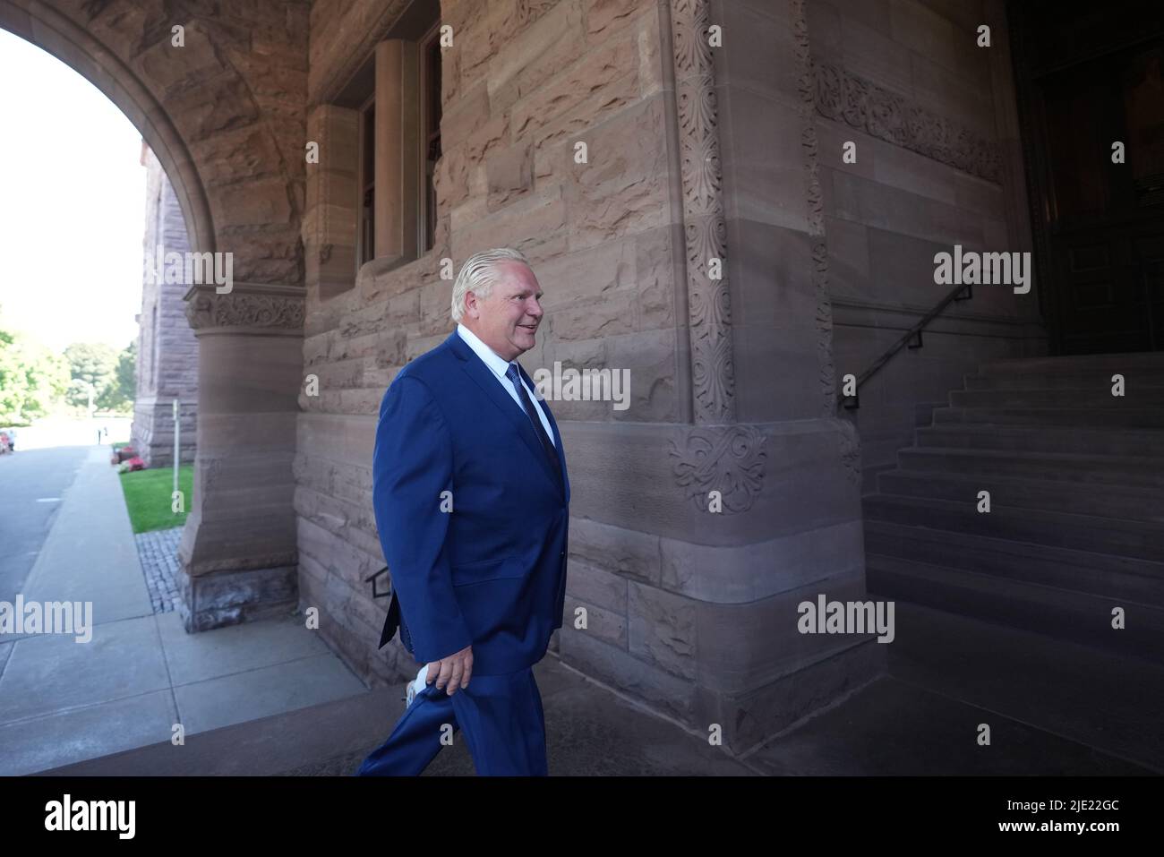 Premier Doug Ford arrives to announce his new cabinet at the swearing ...