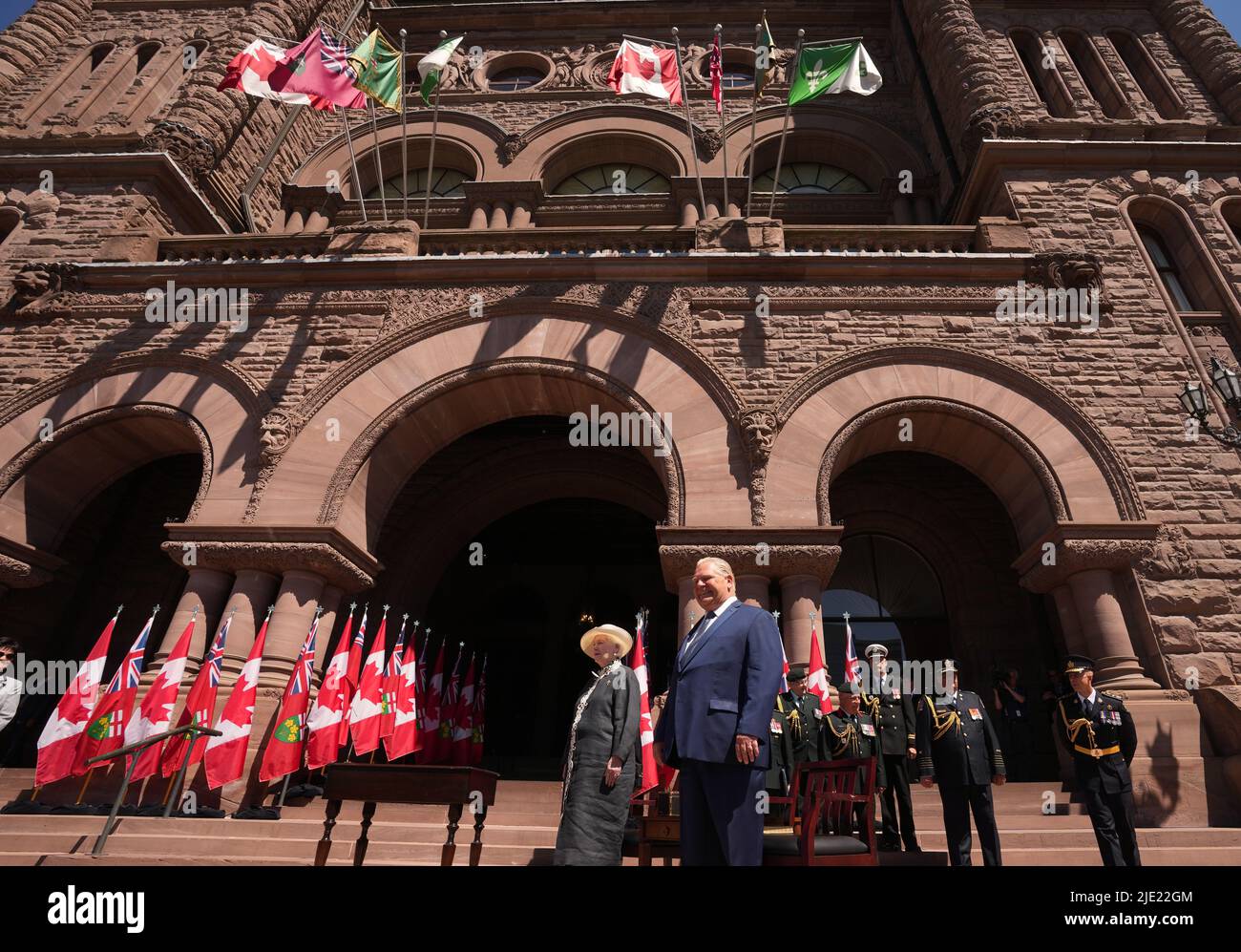 Lieutenant-Governor of Ontario Elizabeth Dowdeswell stands with Premier ...