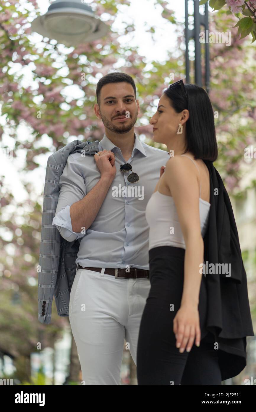 Beautiful business couple are smiling on their break from work Stock ...