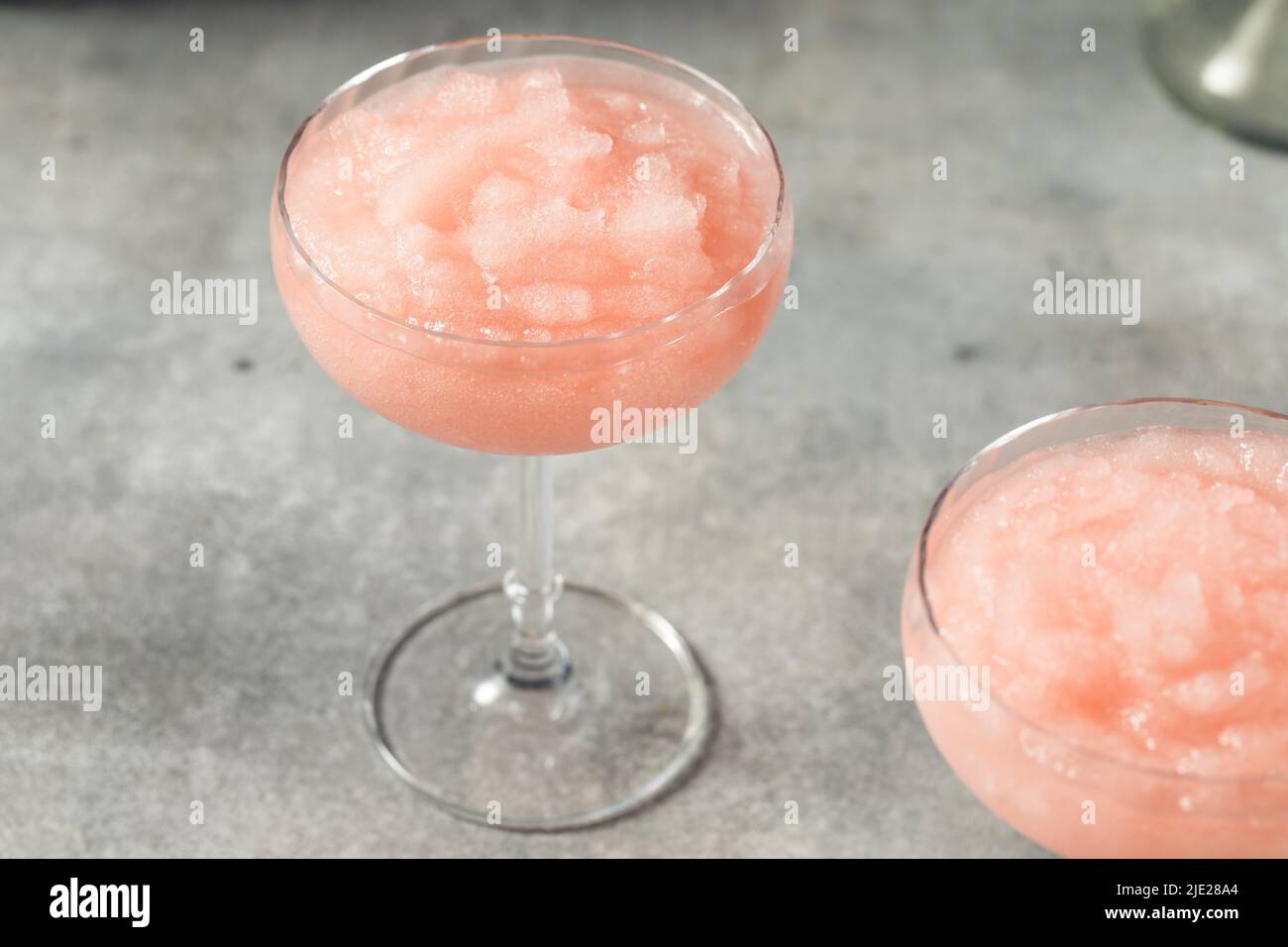Homemade Boozy Frozen Rose Frose Slushie in a Coupe Glass Stock Photo ...