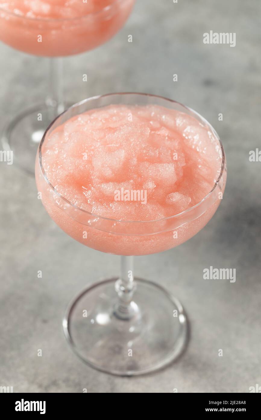 Homemade Boozy Frozen Rose Frose Slushie in a Coupe Glass Stock Photo ...