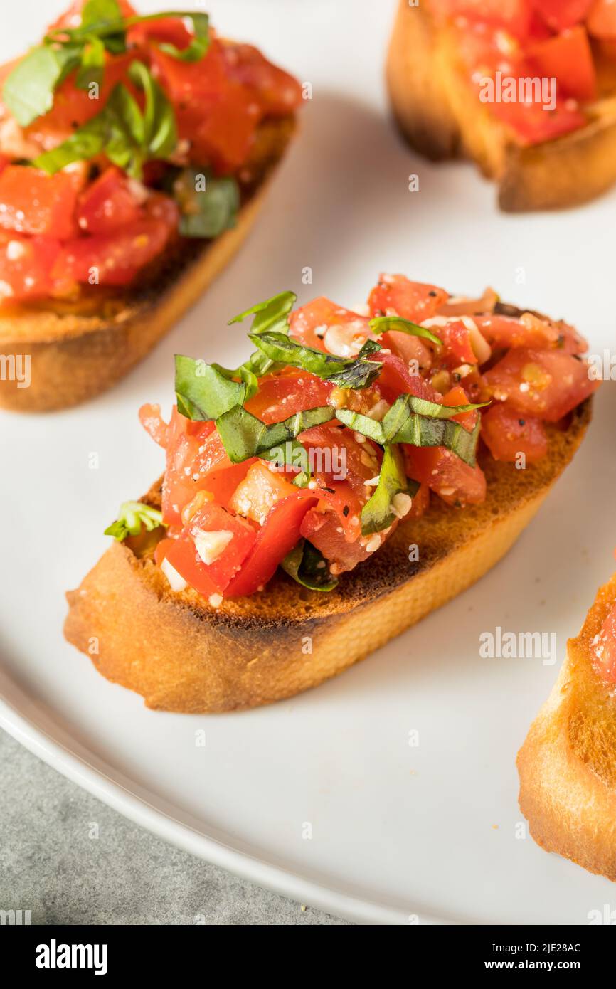 Homemade Healthy Italian Tomato Bruschetta with Basil and Toast Stock ...