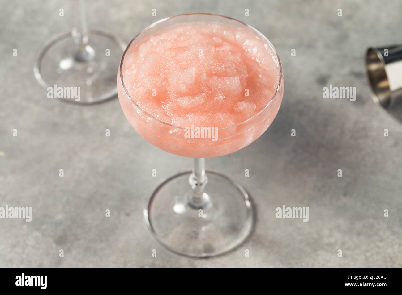Homemade Boozy Frozen Rose Frose Slushie in a Coupe Glass Stock Photo ...