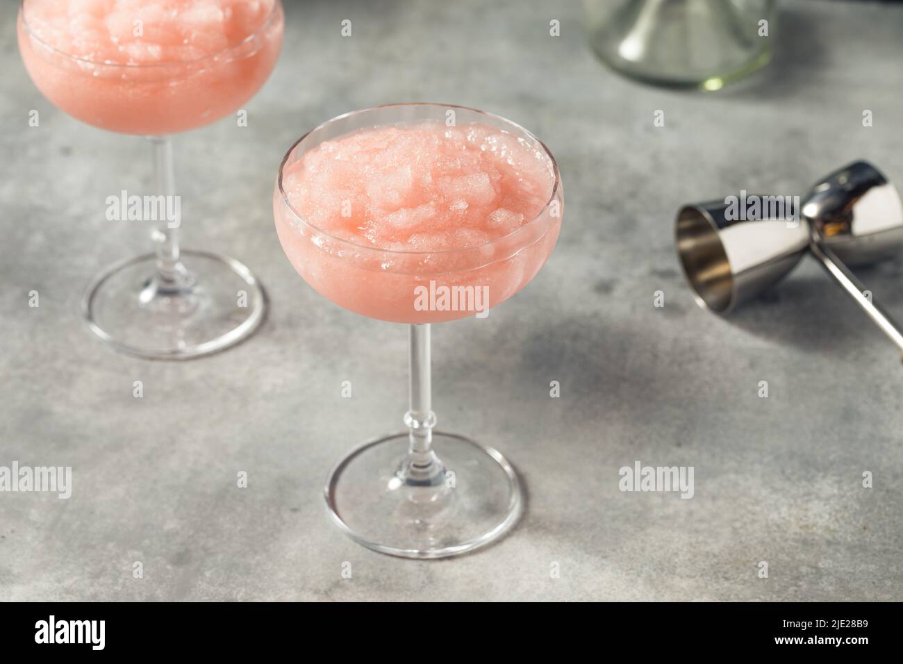 Homemade Boozy Frozen Rose Frose Slushie in a Coupe Glass Stock Photo ...