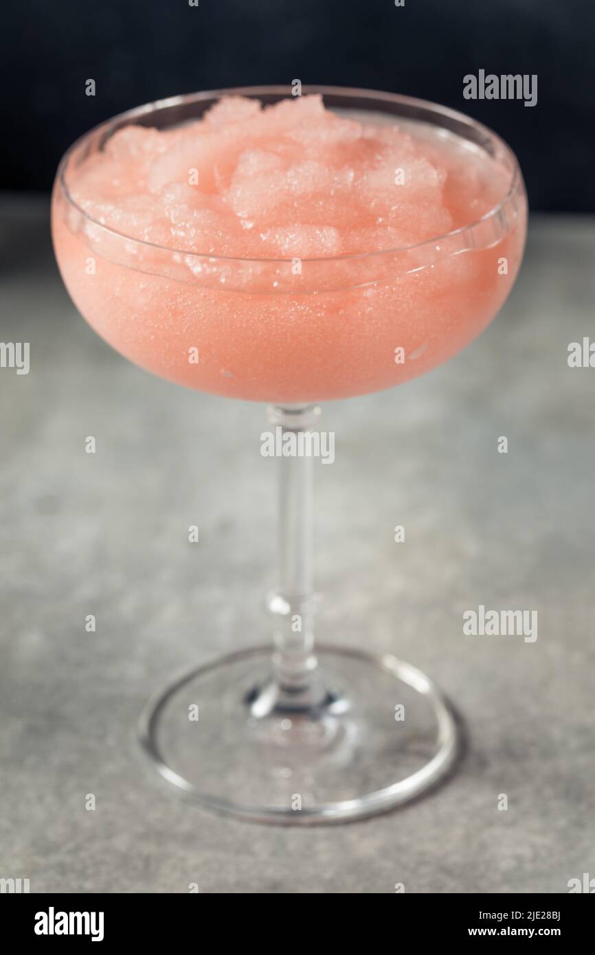 Homemade Boozy Frozen Rose Frose Slushie in a Coupe Glass Stock Photo ...