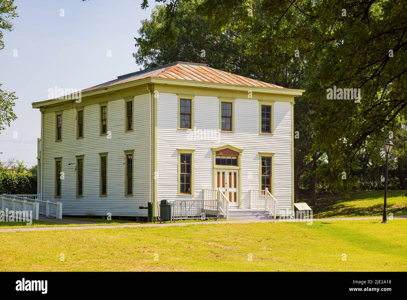 Sunny view of historical Renner School building in Old City Park at ...
