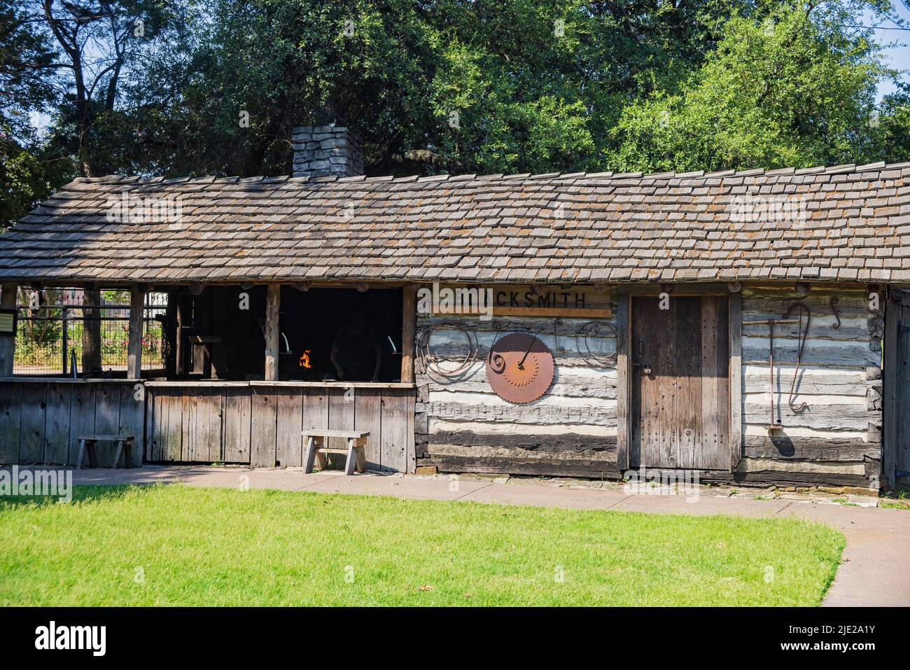 Sunny view of historical building in Old City Park at Dallas, Texas ...