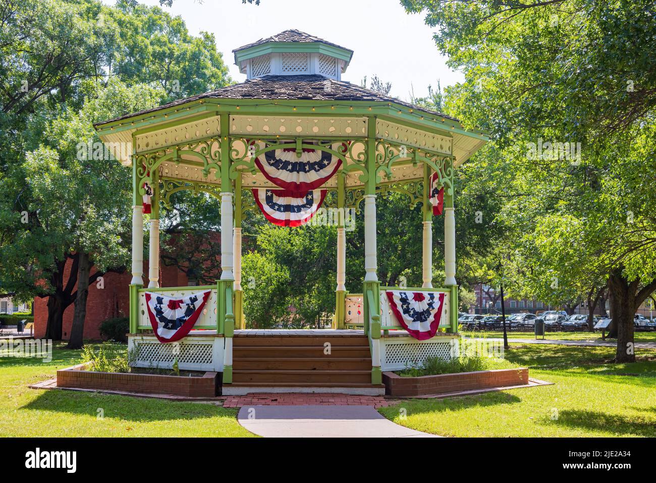 Sunny view of historical building in Old City Park at Dallas, Texas ...