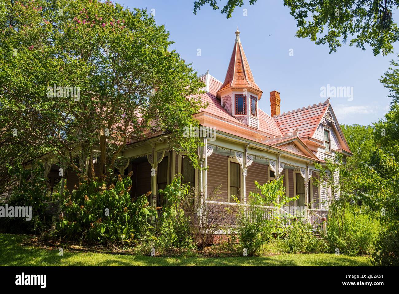 Sunny view of historical building in Old City Park at Dallas, Texas ...