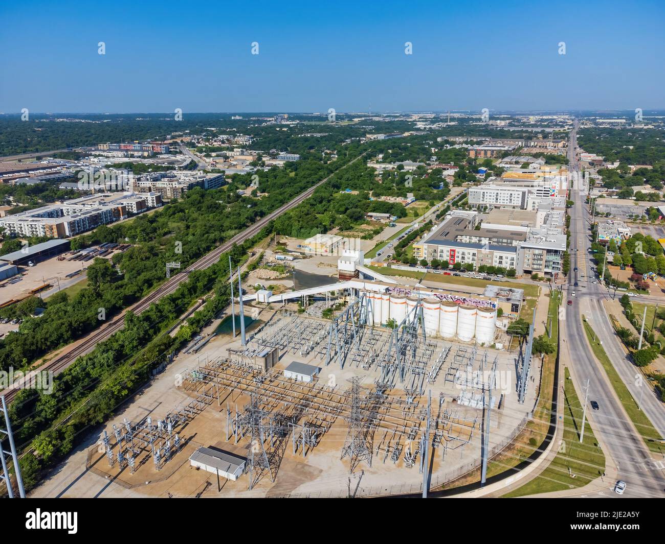 Aerial view of the electrical substation and Dallas downtown cityscape ...